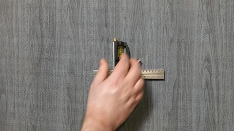 Tools being placed in frame by hand with... | Stock Video | Pond5