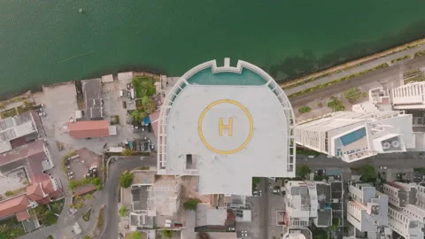 Top down aerial footage of a helipad on ... | Stock Video | Pond5