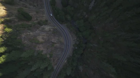 Top Down Aerial View of a Car Driving on... | Stock Video | Pond5