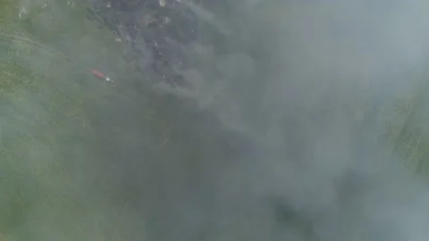 Top down Aerial view of Fire in the fiel... | Stock Video | Pond5