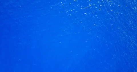 Top down footage of deep blue water with... | Stock Video | Pond5