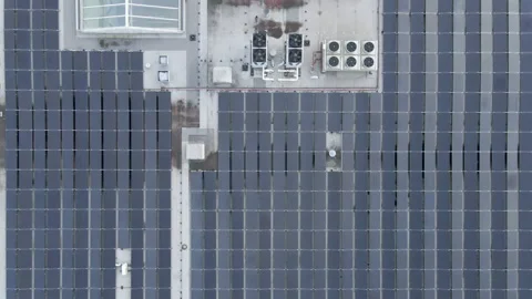 Top down jib down of solar panels on ind... | Stock Video | Pond5