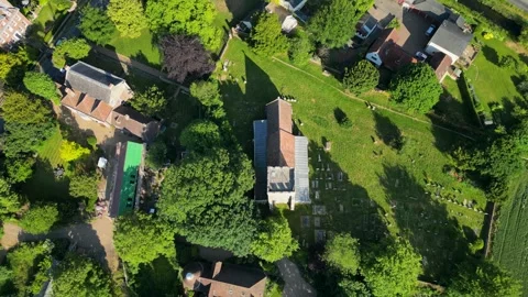 A top-down pan over St Andrew's church, ... | Stock Video | Pond5