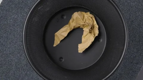 Top Down Shot of Rubbish Being Thrown in... | Stock Video | Pond5