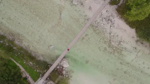 Top down of suspension bridge with woman... | Stock Video | Pond5