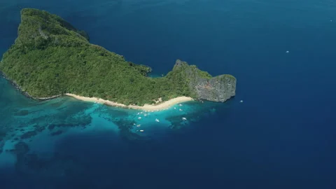 Top down tropic island aerial view at oc... | Stock Video | Pond5