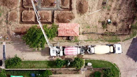 Top down view of cement mixer trucks del... | Stock Video | Pond5