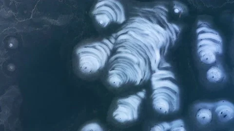 Top down view of empty frozen pond. Film... | Stock Video | Pond5