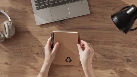 Top down view of girl open her notebook ... | Stock Video | Pond5