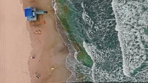 Top down view of lifeguard tower flooded... | Stock Video | Pond5