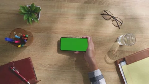 Top Down View Of Man'S Hand Holding Mock... | Stock Video | Pond5