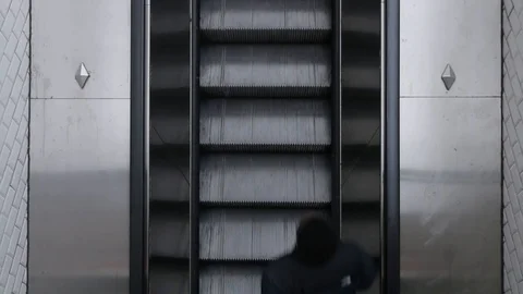 Top down view of moving up escalator in ... | Stock Video | Pond5