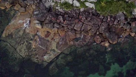 Top Down View Ocean Rocks Beautiful Wate... | Stock Video | Pond5