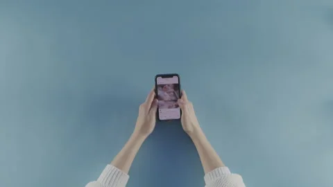 Person Scrolling Phone Stock Video Footage | Royalty Free Person Scrolling Phone Videos | Pond5