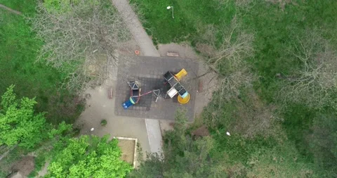 Top down view Playground for kids in a p... | Stock Video | Pond5