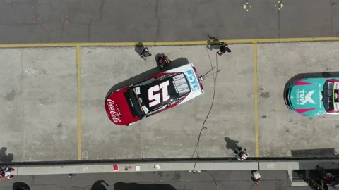 Top down view of Racing team working at ... | Stock Video | Pond5