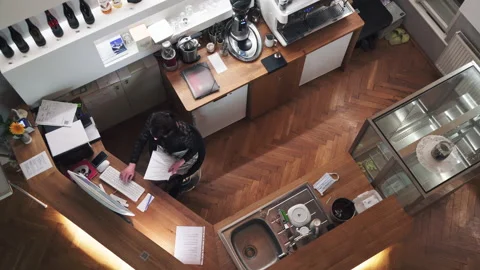 Top down view of reception girl using co... | Stock Video | Pond5