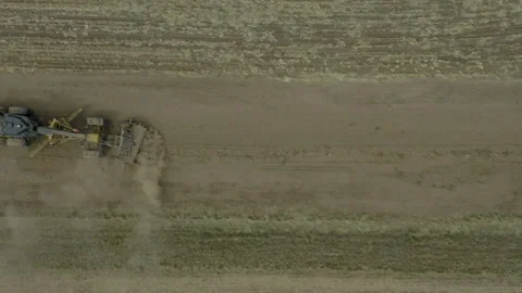 Top down view of road grader smoothing o... | Stock Video | Pond5