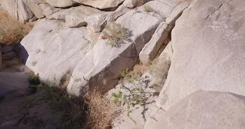 Top down view of rocks and boulders with... | Stock Video | Pond5