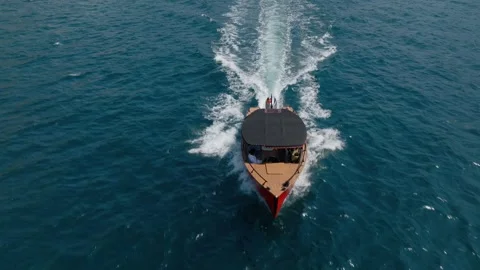 Top down view speed boat goes in the sea... | Stock Video | Pond5