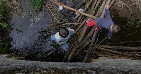 Top down view of two children playing on... | Stock Video | Pond5