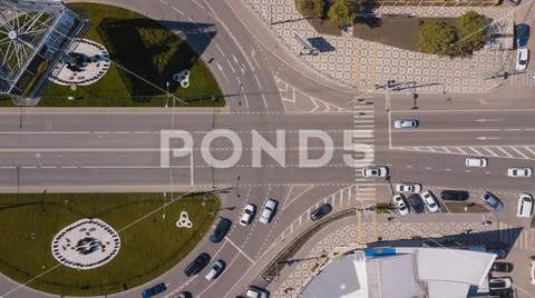 Top down view of urban road traffic, roundabout, junction route traffic ...