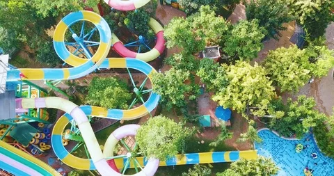 Top down view of visitor sliding on wate... | Stock Video | Pond5