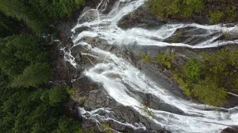 Top-Down View of Waterfalls Merging into... | Stock Video | Pond5