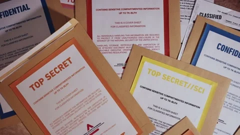 Top secret files in brown manila folders... | Stock Video | Pond5