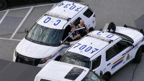 Top shot of police officer chatting with... | Stock Video | Pond5