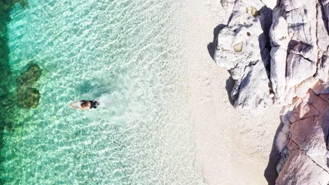 Top view 4K drone video of woman dressed... | Stock Video | Pond5