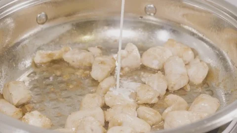 Top view of adding milk to the pan with ... | Stock Video | Pond5