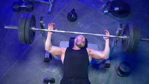 Top view of athlete bodybuilder lying on... | Stock Video | Pond5