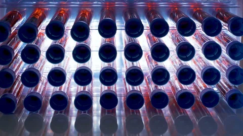 The top view of the blue cap tubes in th... | Stock Video | Pond5