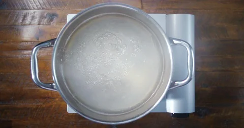 Top View Boiling Noodles in Water and Oi... | Stock Video | Pond5