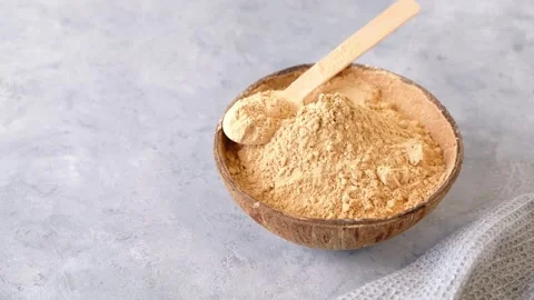 Top view of a bowl with raw maca root po... | Stock Video | Pond5