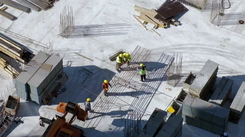 Top view: builders working with a metal ... | Stock Video | Pond5