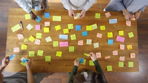 Top View of Business Team Taking Off Sti... | Stock Video | Pond5