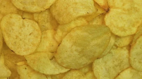 Top view chips spinning, fried potatoes ... | Stock Video | Pond5