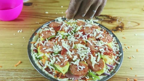 top view closeup on man hands put grated... | Stock Video | Pond5