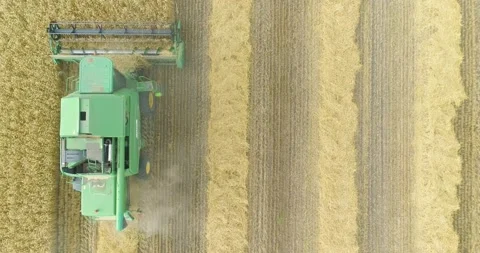 Top view of a combine harvester harvesti... | Stock Video | Pond5