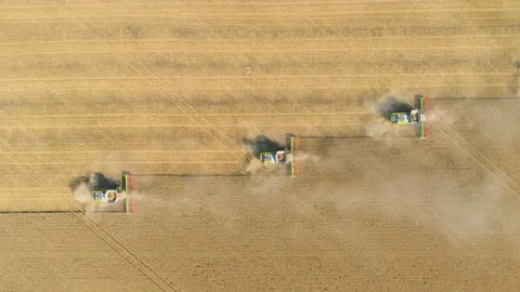 Top view of combine harvesters working i... | Stock Video | Pond5
