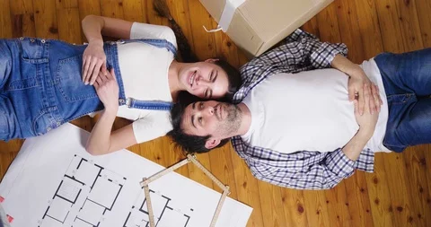 Top view of a couple on the floor planni... | Stock Video | Pond5