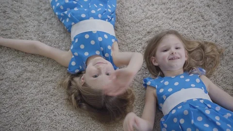 Top view of cute little Caucasian girls ... | Stock Video | Pond5