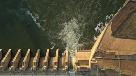 Top view of dam wall with flowing sluice... | Stock Video | Pond5