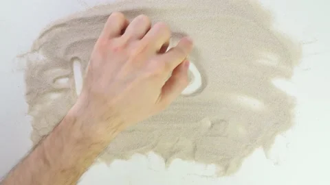 Top view draw on the sand. Caucasian han... | Stock Video | Pond5