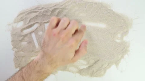 Top view draw on the sand. Caucasian han... | Stock Video | Pond5