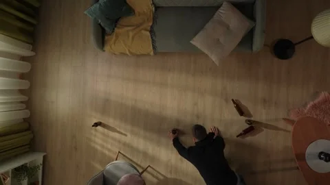 Top view of a drunken man crawling on al... | Stock Video | Pond5