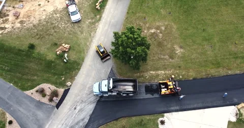 Top view dump truck dumping asphalt for ... | Stock Video | Pond5