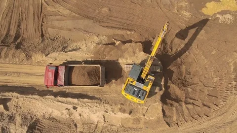 Top view of Excavator working on constru... | Stock Video | Pond5